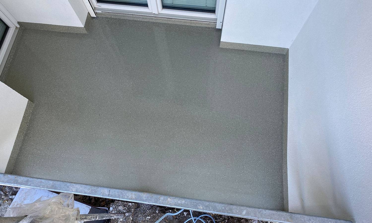 Thermische Balkonsanierung im Mehrfamilienhaus mit Triflex BTS-P | Haustec